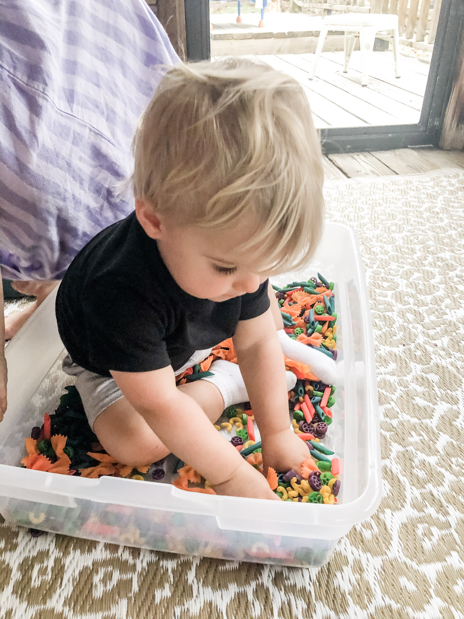 How to Make a Rainbow-Dyed Pasta Sensory Bin for Toddlers ...